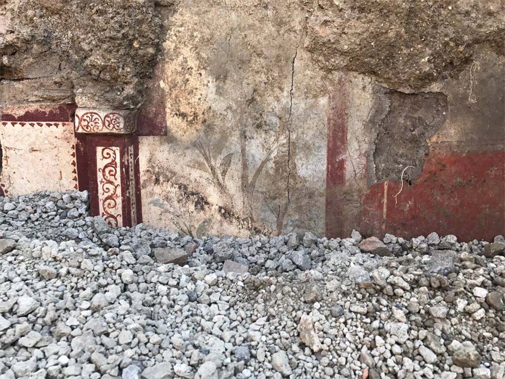 V.3.13 Pompeii. 2018. Room 2a. East wall. A sumptuous painted lararium begins to emerge from the ...